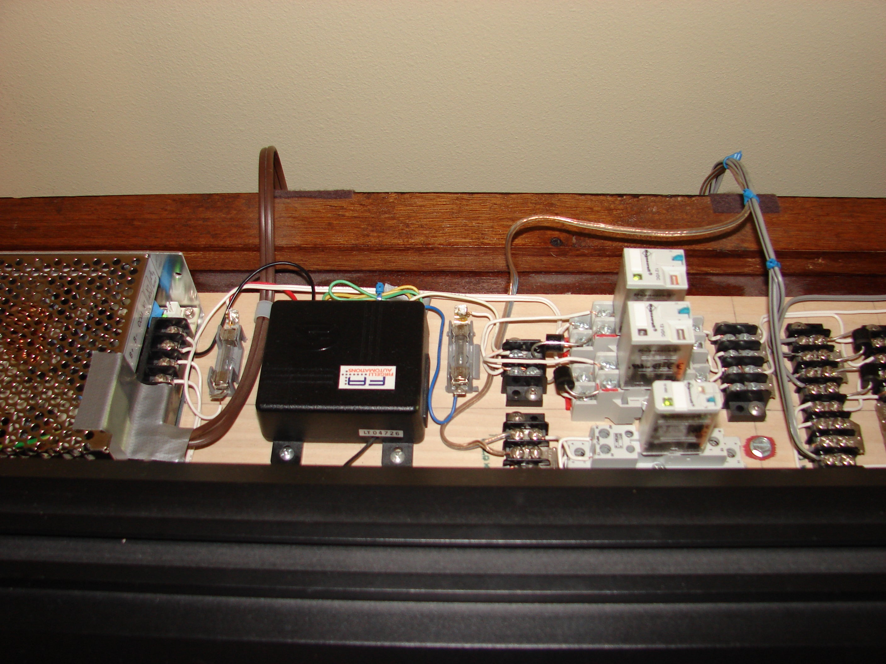 Building a Hidden Projector Screen Pop-out From a Cabinet